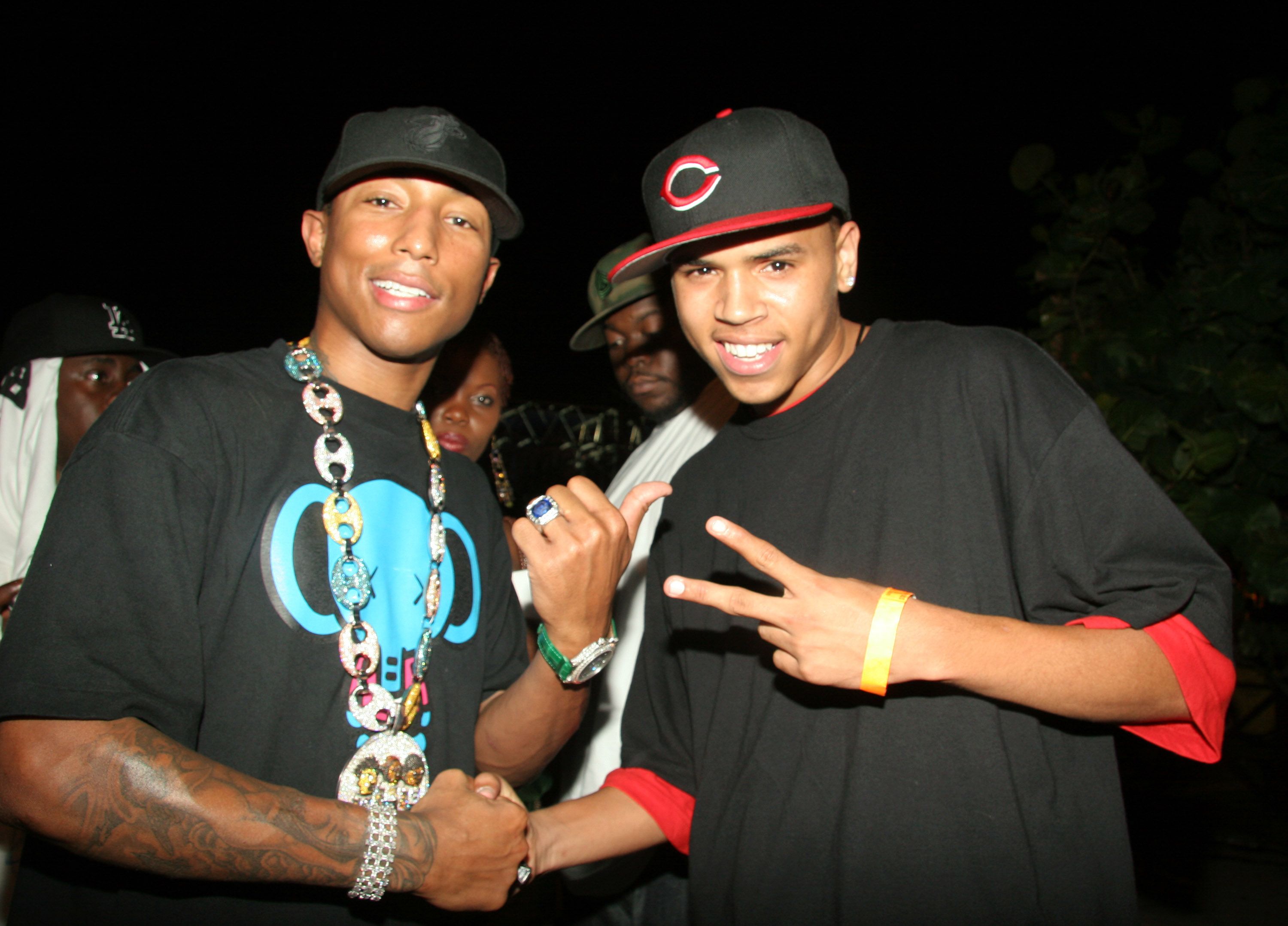 Chris Brown Posts Photo With Pharrell