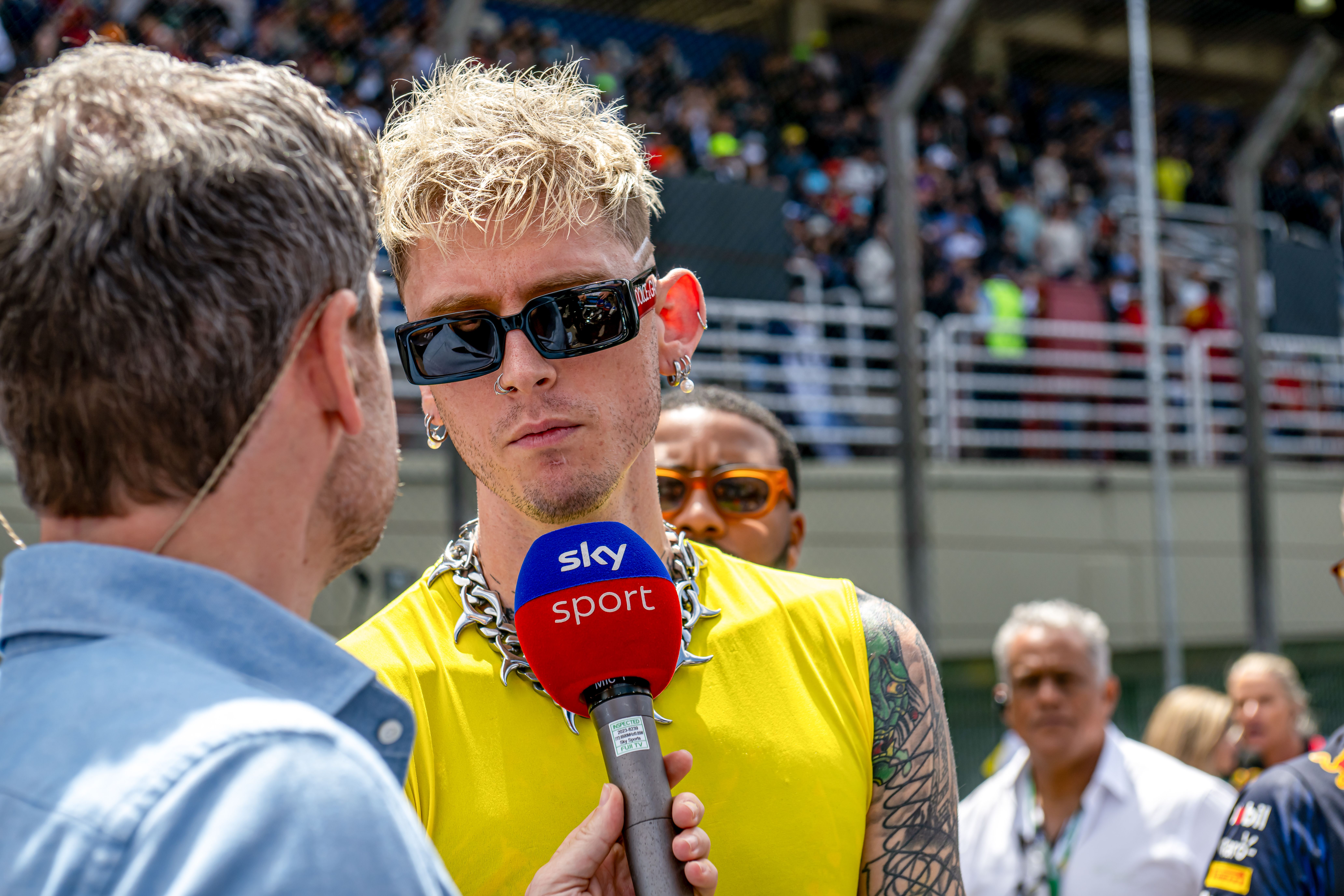 Machine Gun Kelly On Fans Clowning His F1 Interview: "I Hate Being In ...