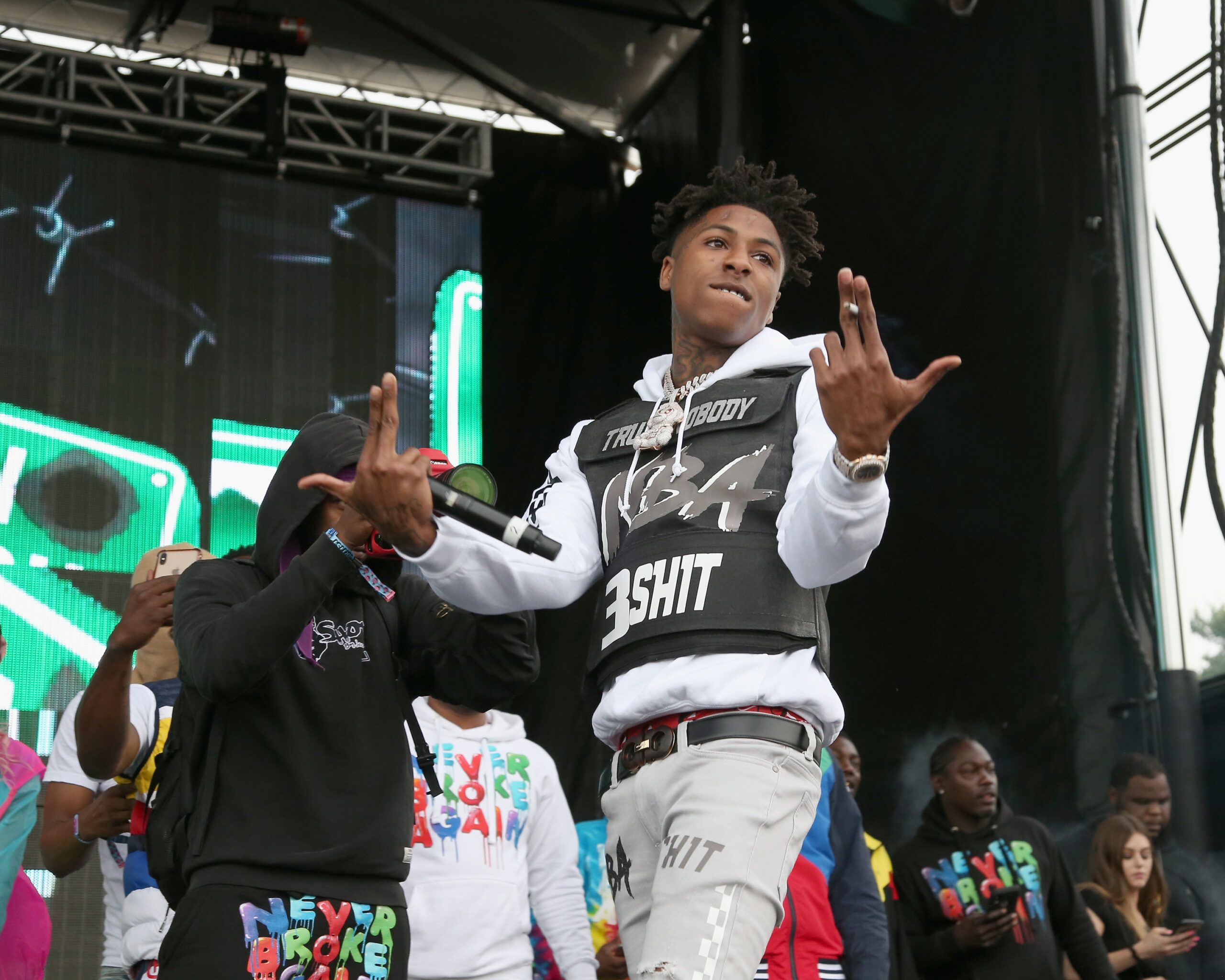 NBA YoungBoy Holds Hands With Male Fan, Viral Photo Reactions Pour In