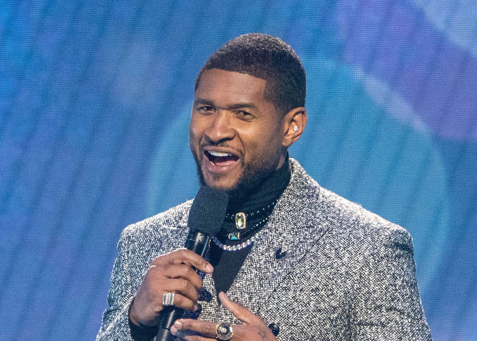 Usher Runs Into Unexpected Issue While Feeding Fan A Cherry