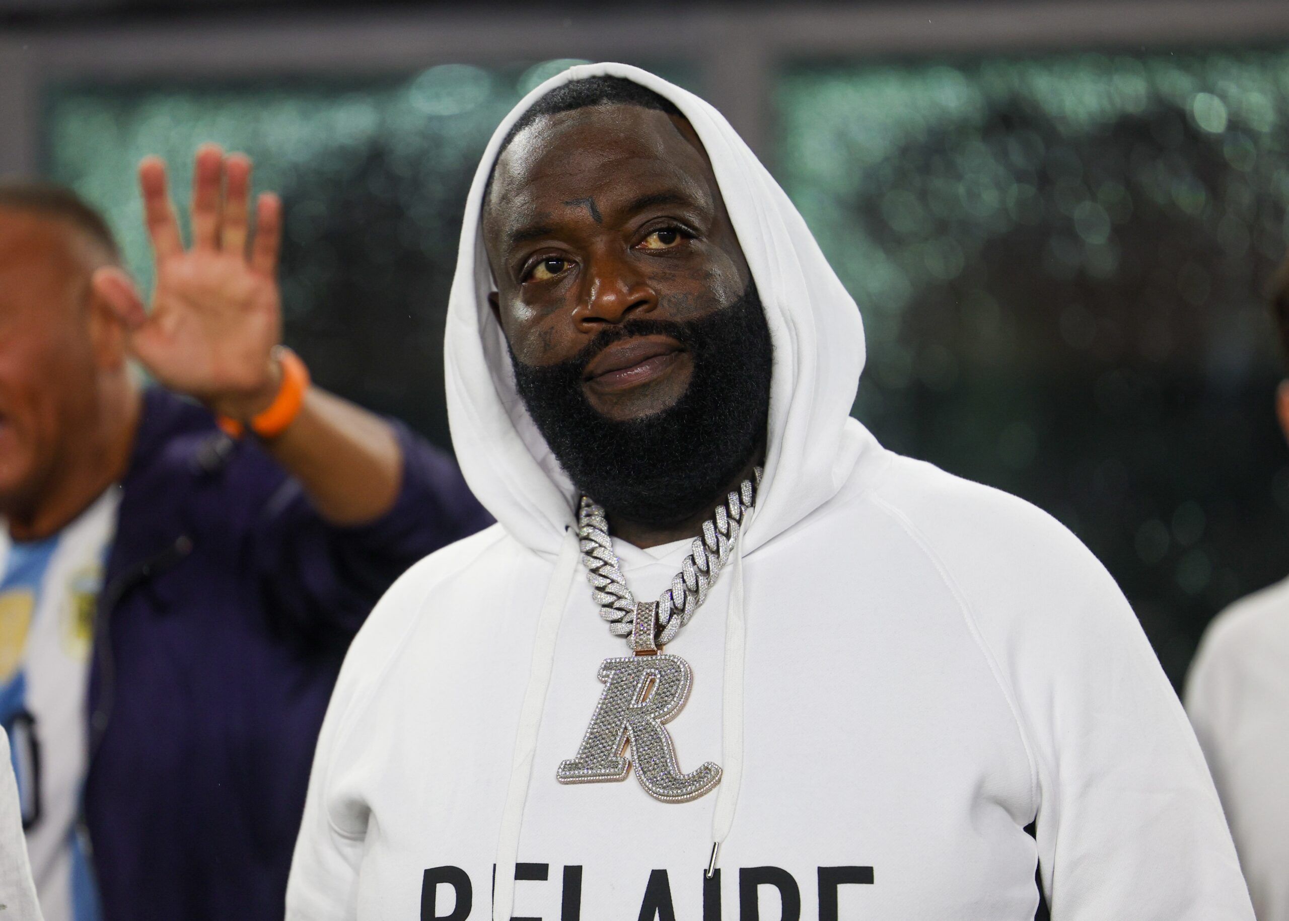 Rick Ross & Rumored Girlfriend Enjoy Miami Dolphins Game