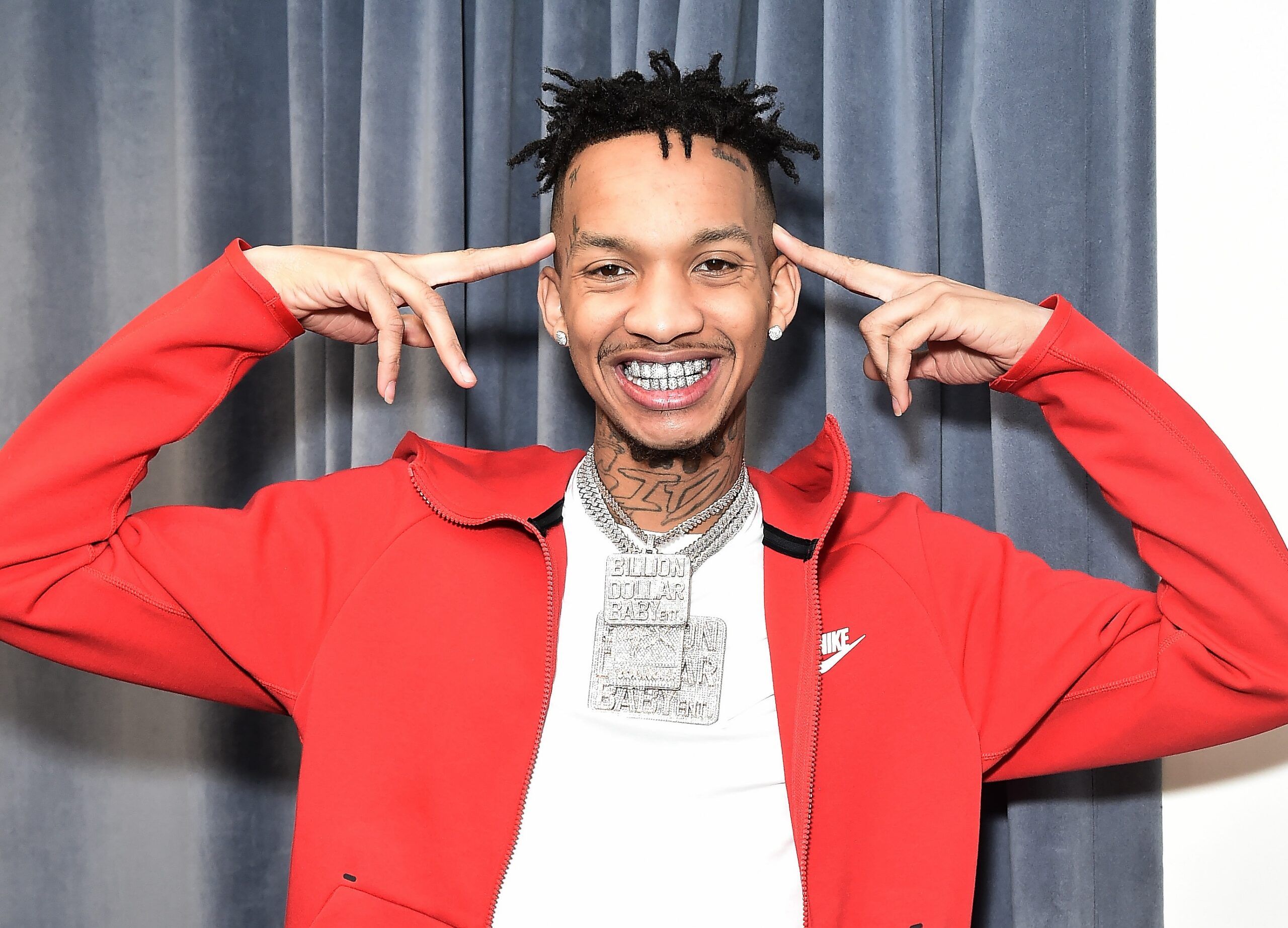 Stunna 4 Vegas Praised For Pink Suit At Viral Wedding To Monaleo