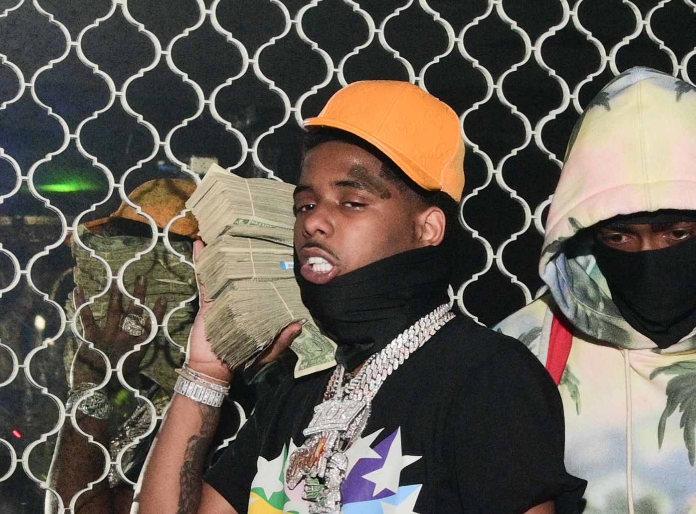 Pooh Shiesty Flexes Huge Stacks Of Cash After Prison Release