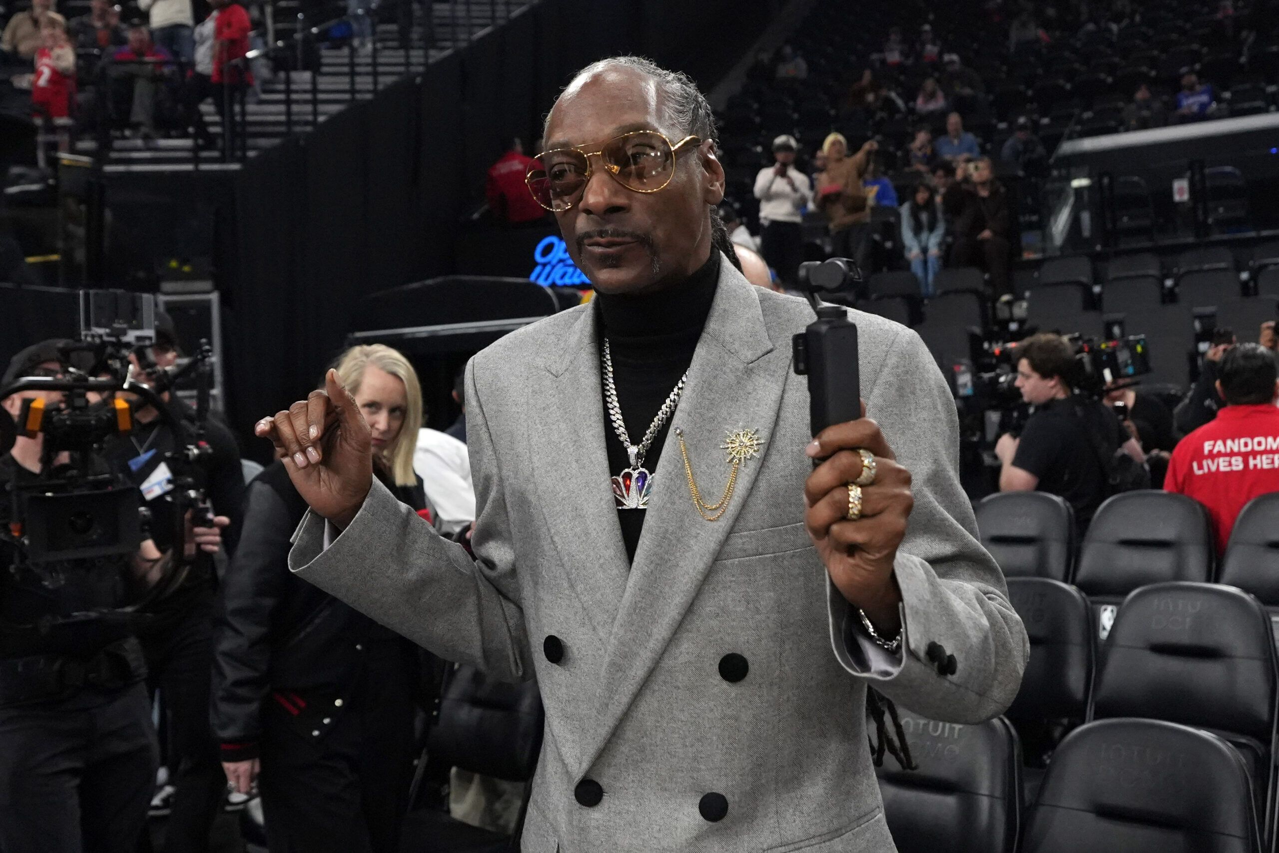 Snoop Dogg Carries The Olympic Torch Before The Winter Games