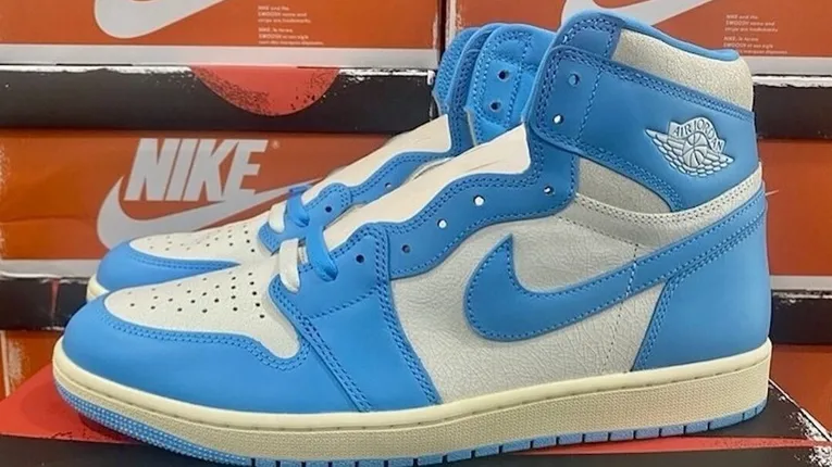 New Images Reveal Vintage Packaging On Air Jordan 1 High “UNC Reimagined”