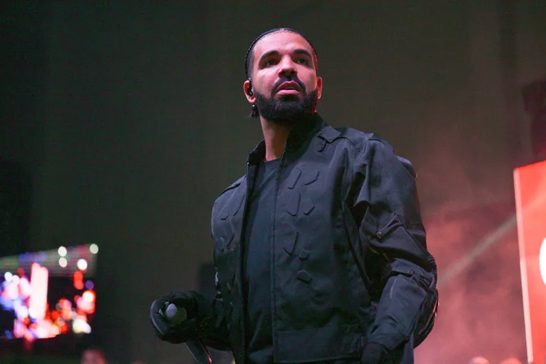 Drake Enlists Morgan Wallen For Explosive "You Broke My Heart" Music Video