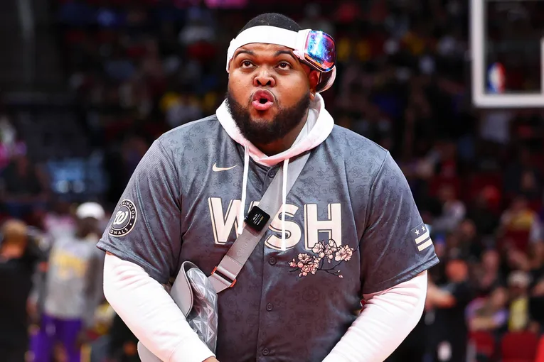 Druski Struggles To Fit Inside Cop Car In Newly Surfaced Arrest Footage