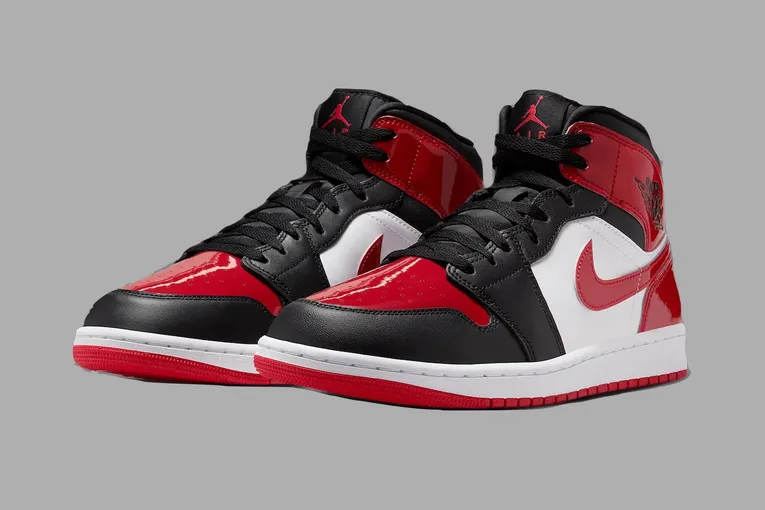 Air Jordan 1 Mid "Black/Varsity Red" Drops Shiny With Flair