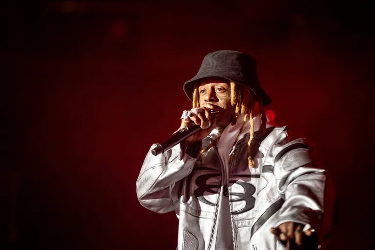 Lil Wayne's Rock Performance Divides Fans During Latest Concert