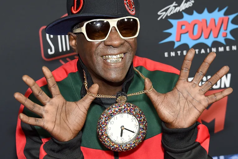 Flavor Flav Visits Harvard & Gifts The School His Iconic Clock Chain