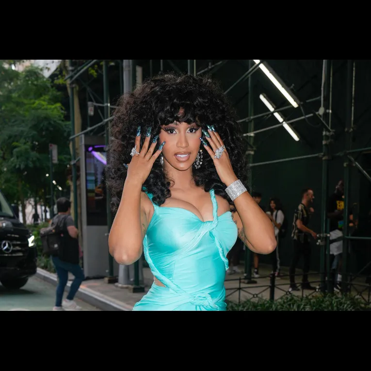 Cardi B Flaunts Her Curves In Edgy Fishnet Fit