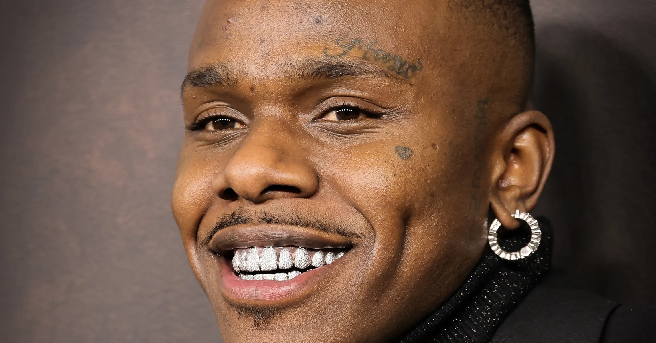 DaBaby Hangs With Ja Morant's Dad Courtside