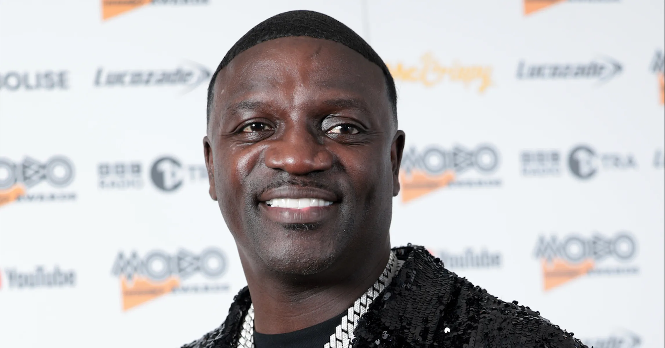 Akon Clowned For His Hair Piece