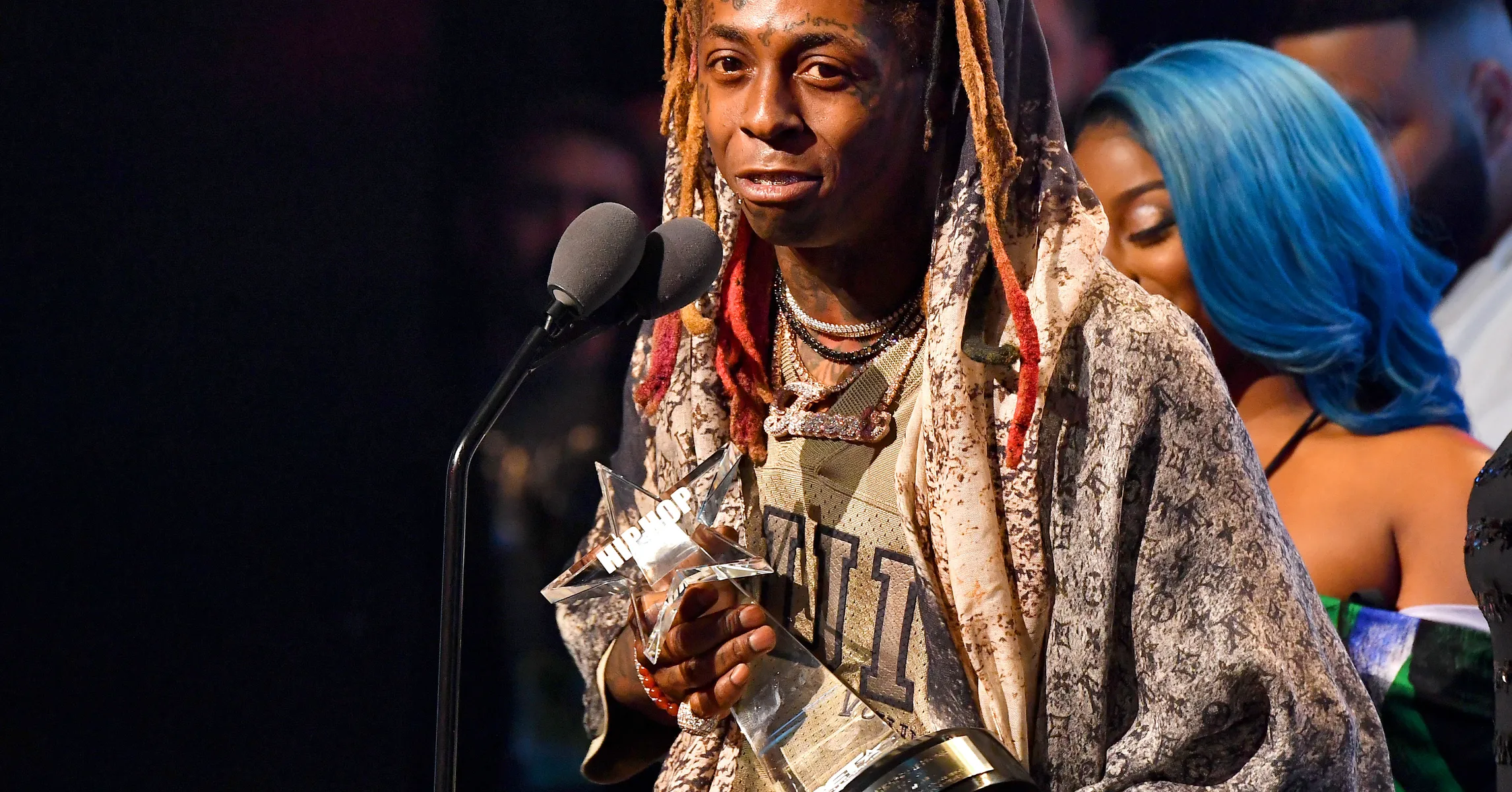 Lil Wayne Watches Skateboarding Videos During Grammys Party