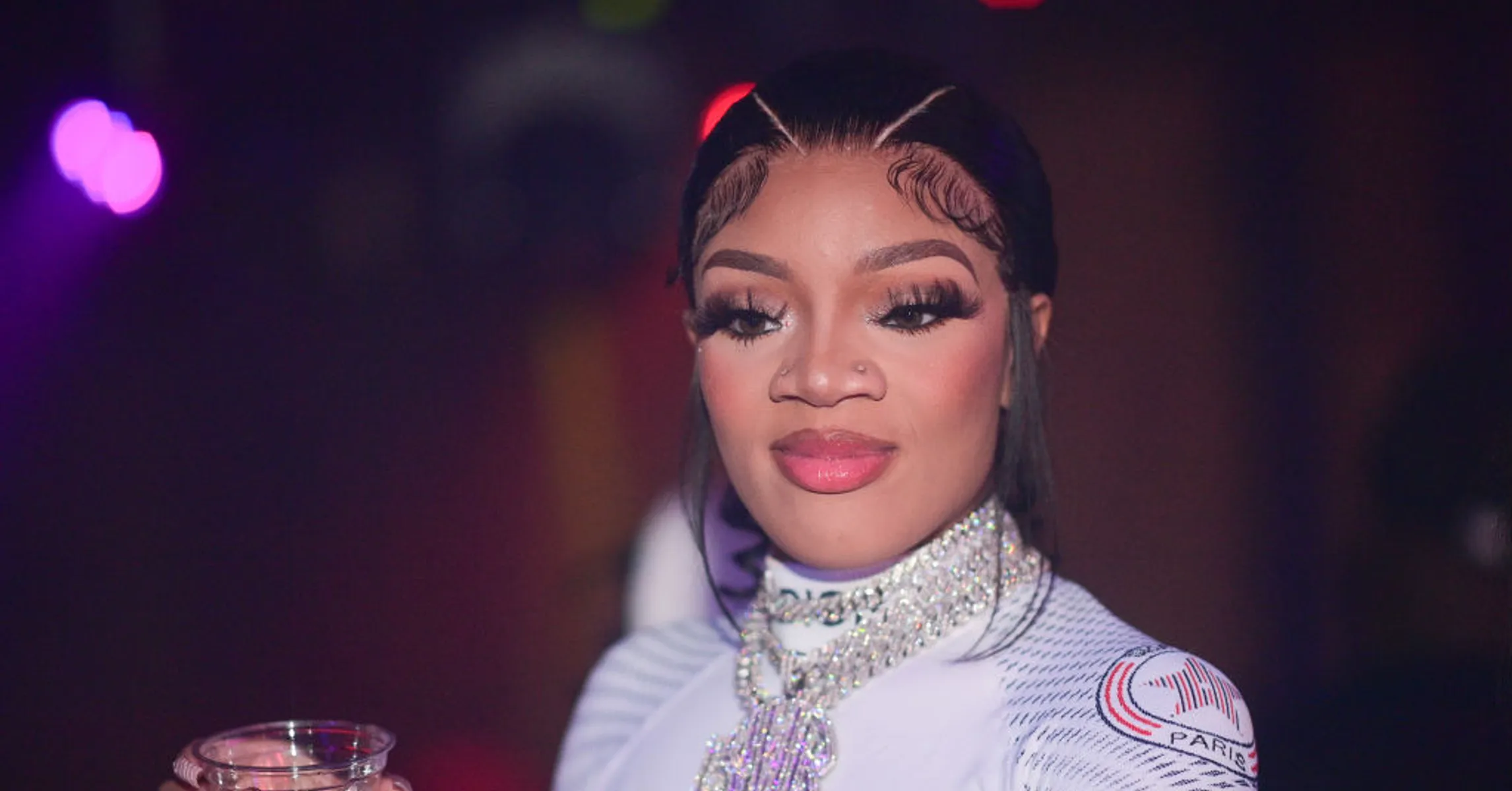 GloRilla Fan Catches Wig At Show And Installs It