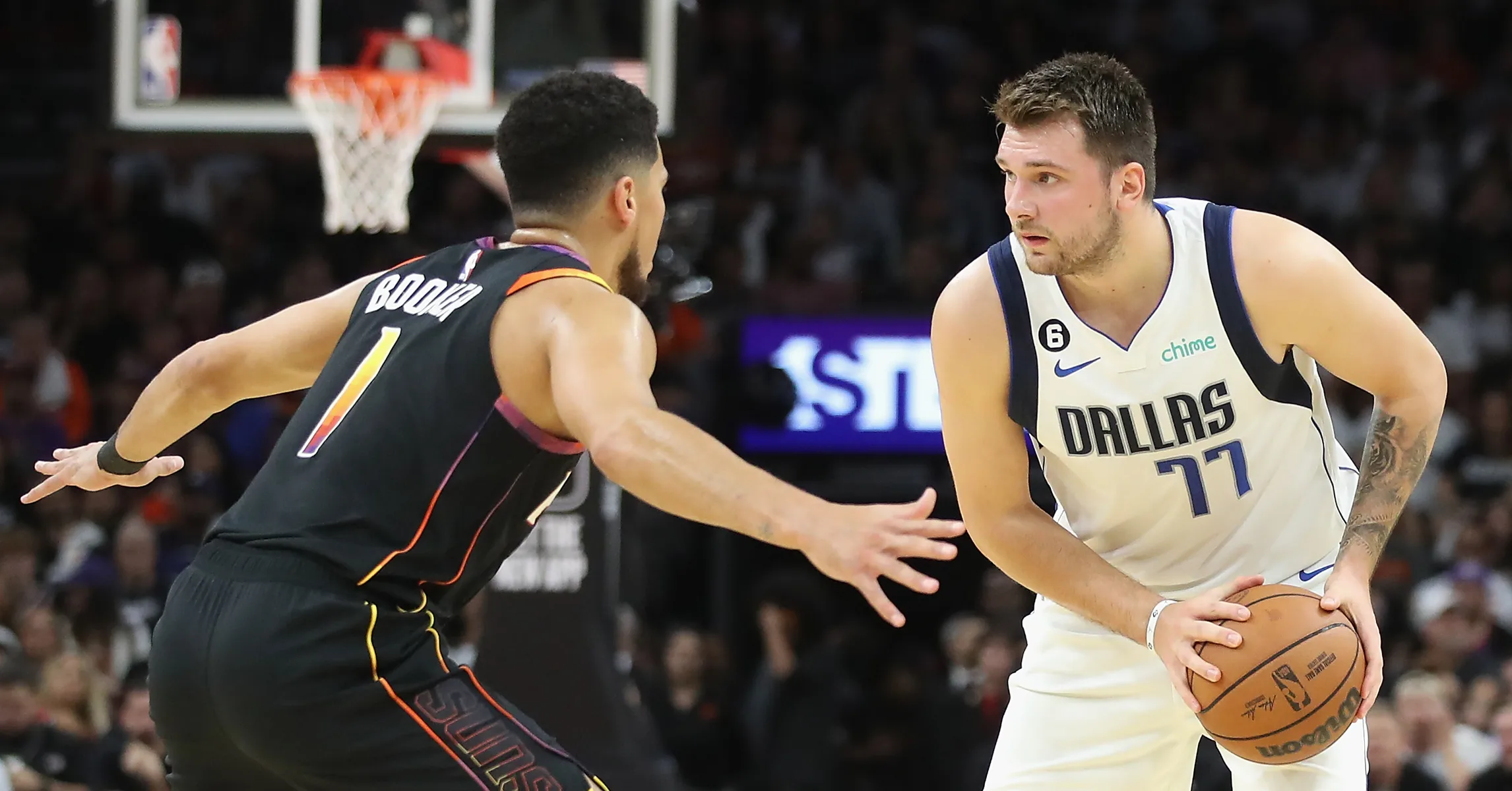 Luka Doncic & Devin Booker Get Into Heated Exchange