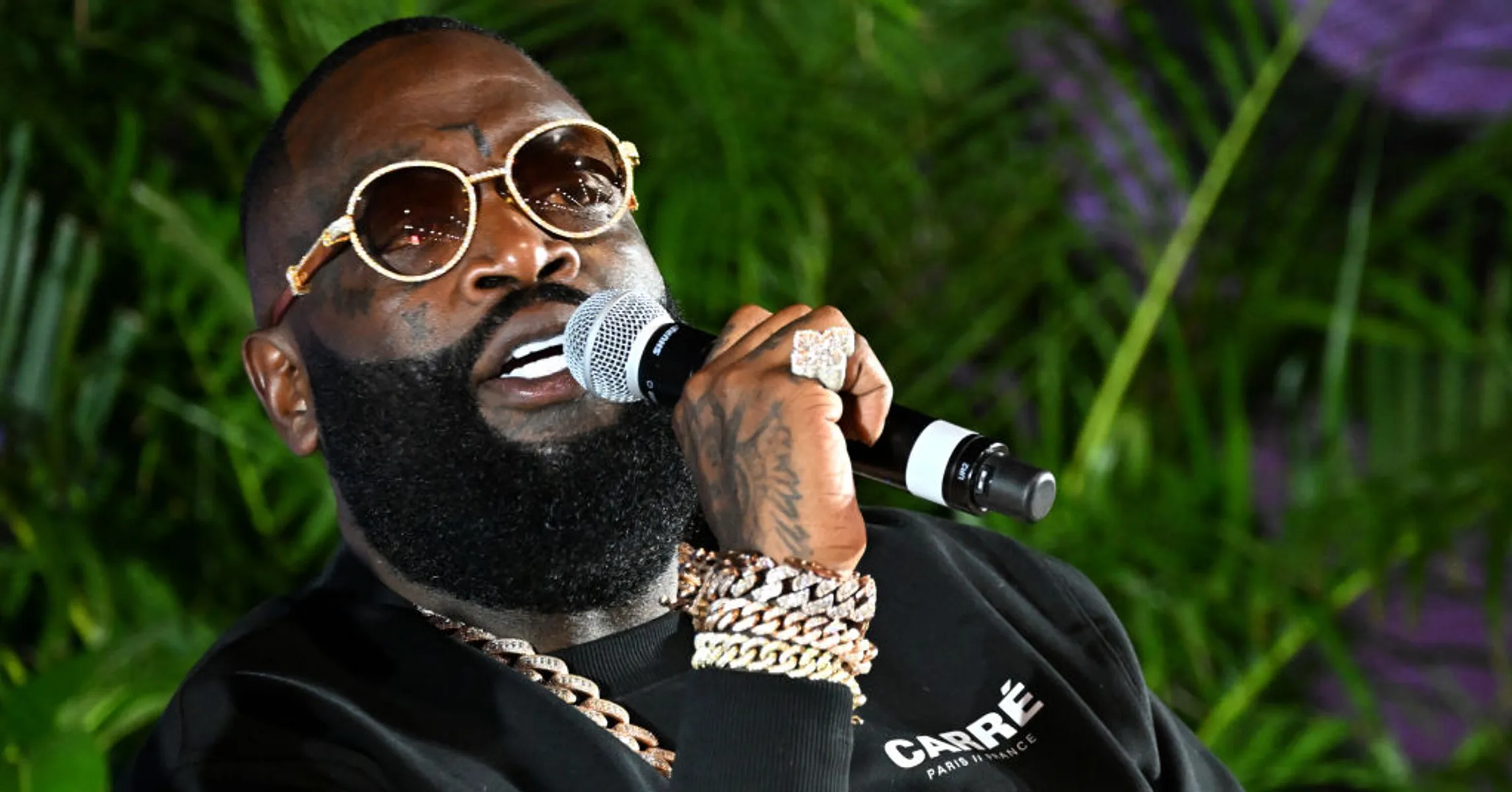 Rick Ross Explains Viral Diving Fail: "My Knees Caught A Flat"