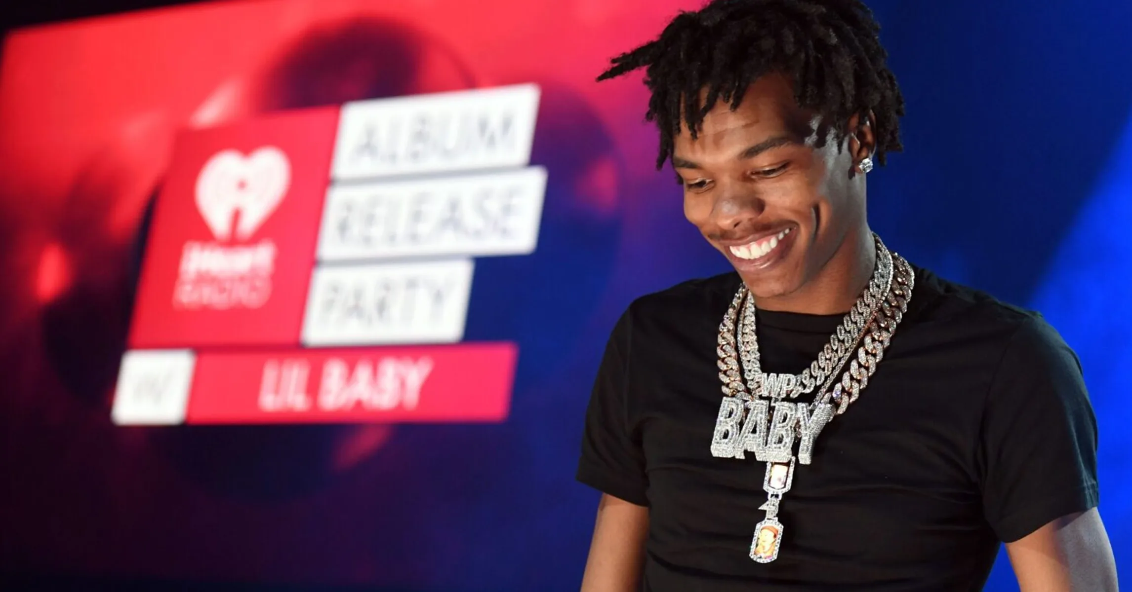 Lil Baby Poses With Stacks Of Cash Following Concert Cancelations
