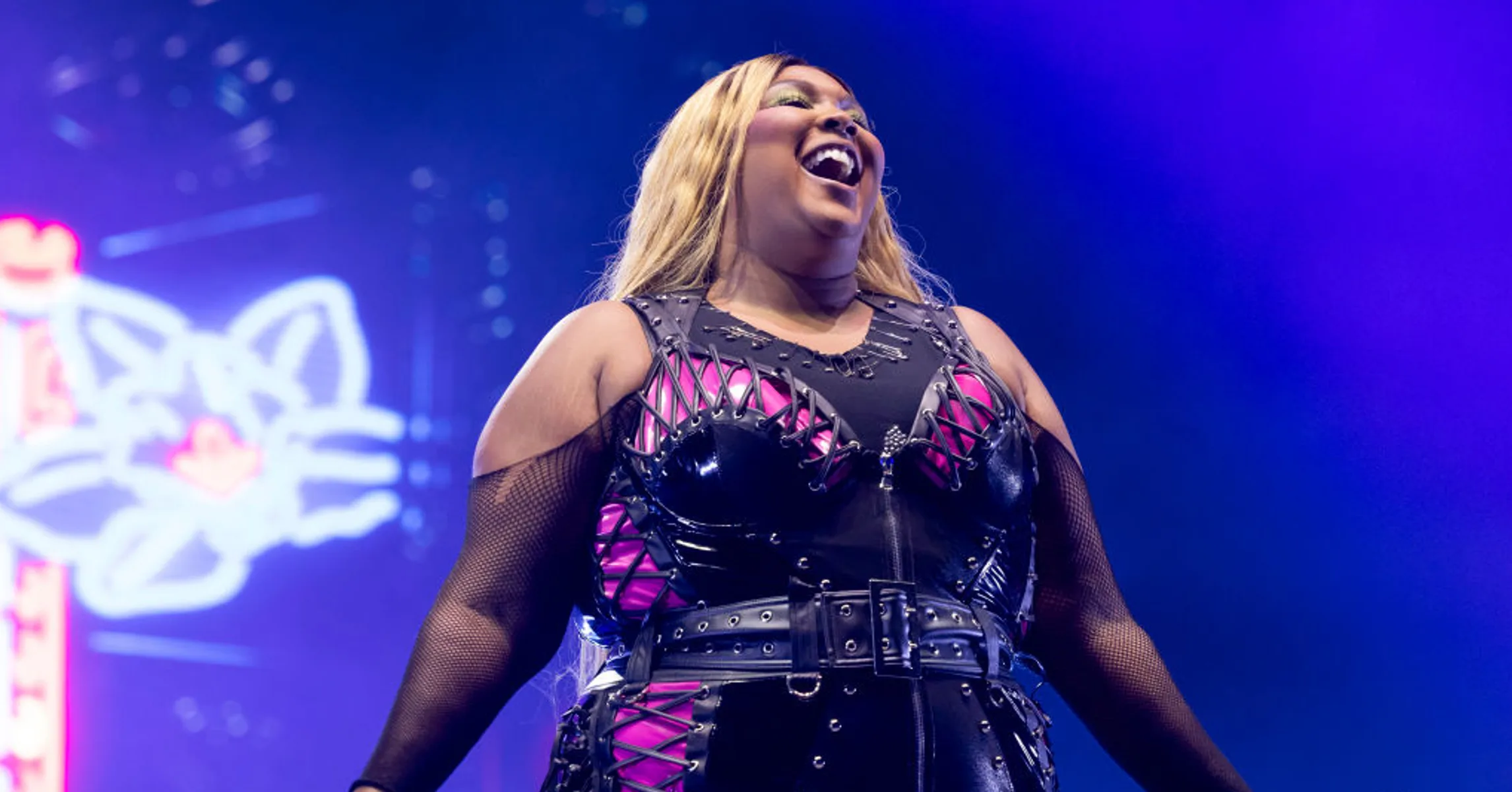 Lizzo Signs Australian Fan's Butt During Performance