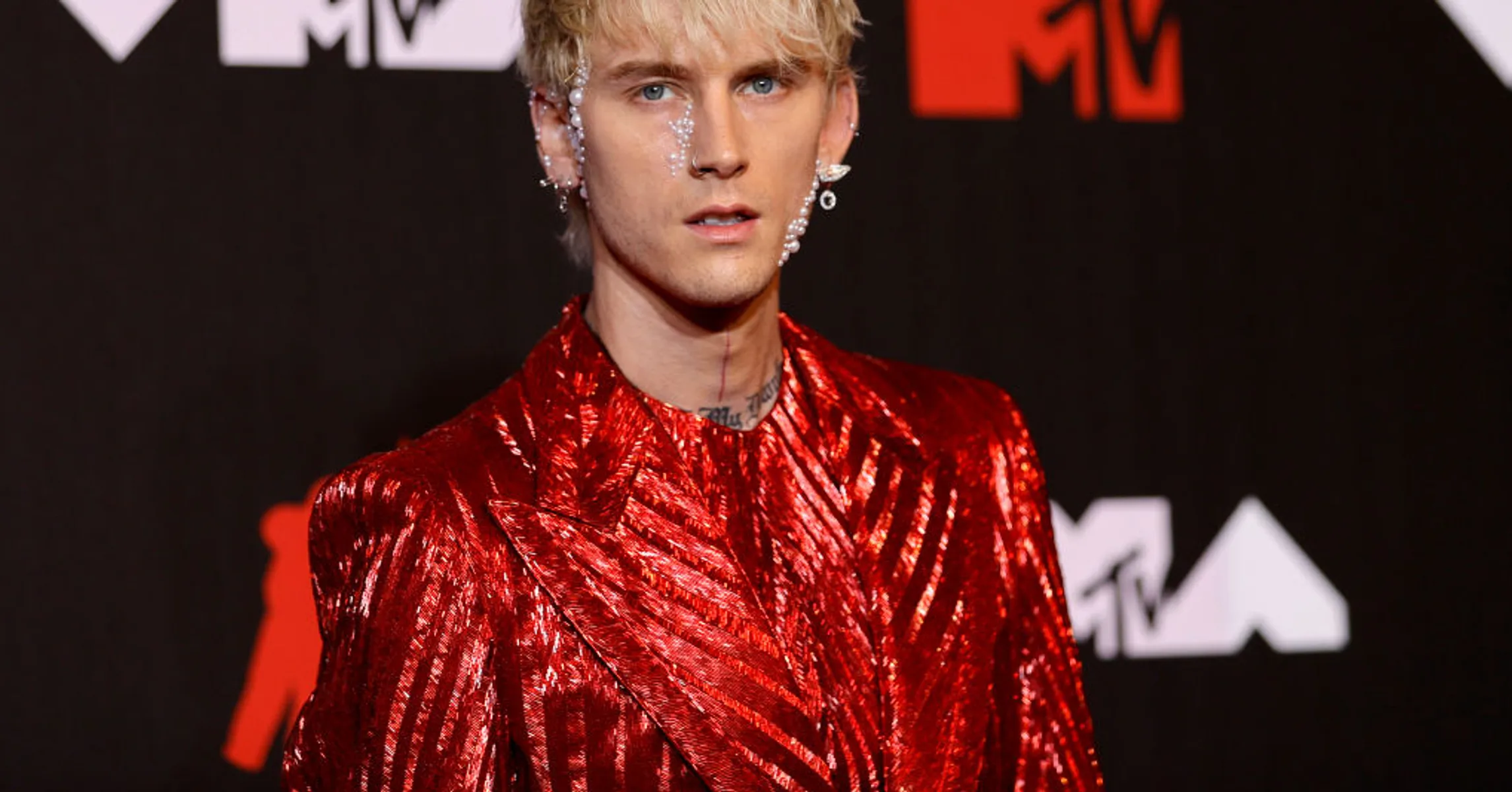 Machine Gun Kelly Punches Fan's Face During Performance