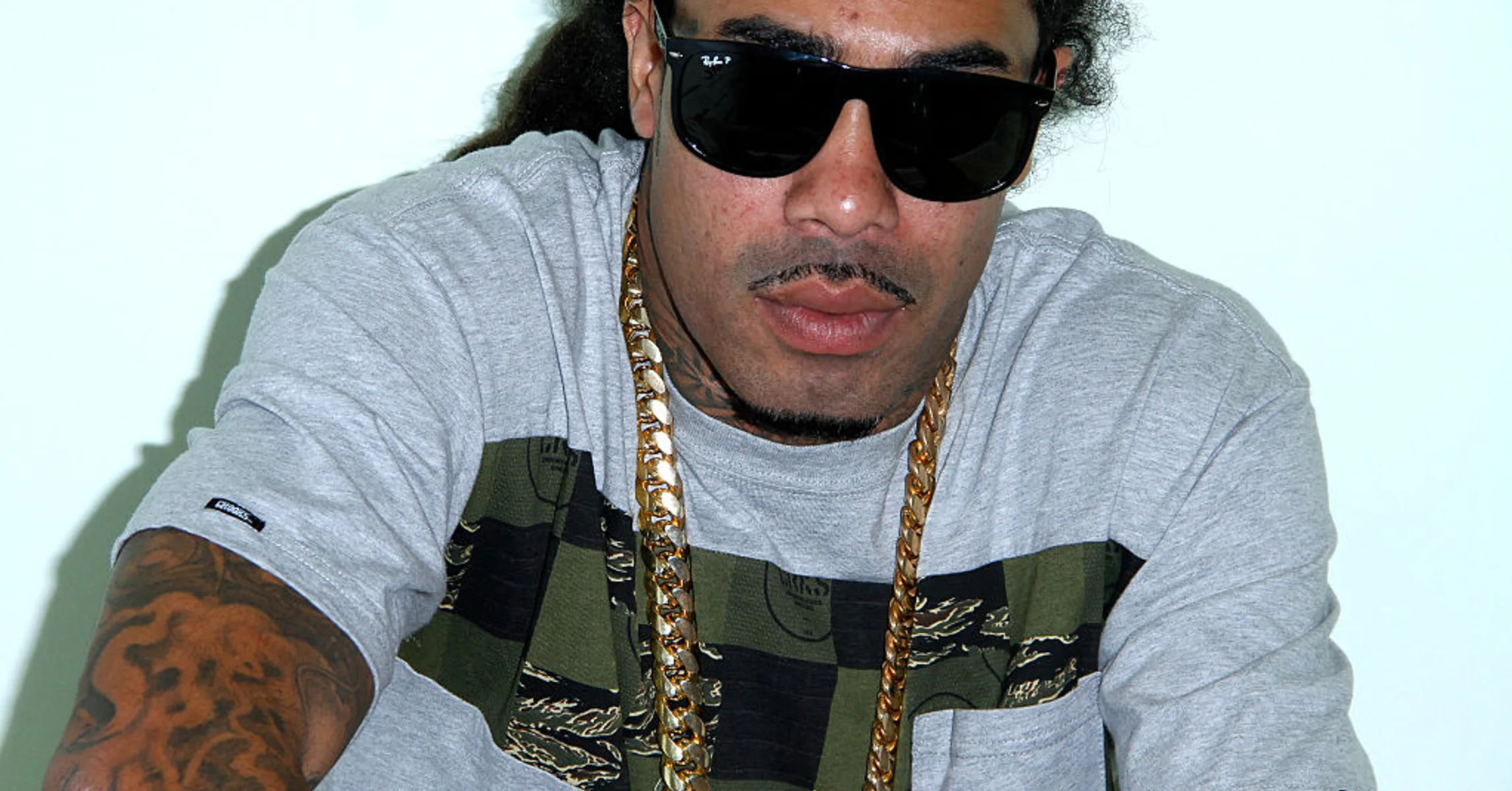 Gunplay Arrested For Allegedly Pointing Rifle At Wife Holding Their Baby