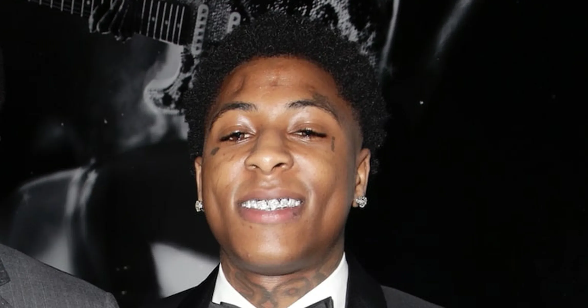 NBA YoungBoy Dresses As Santa Claus To Take Kids Sledding