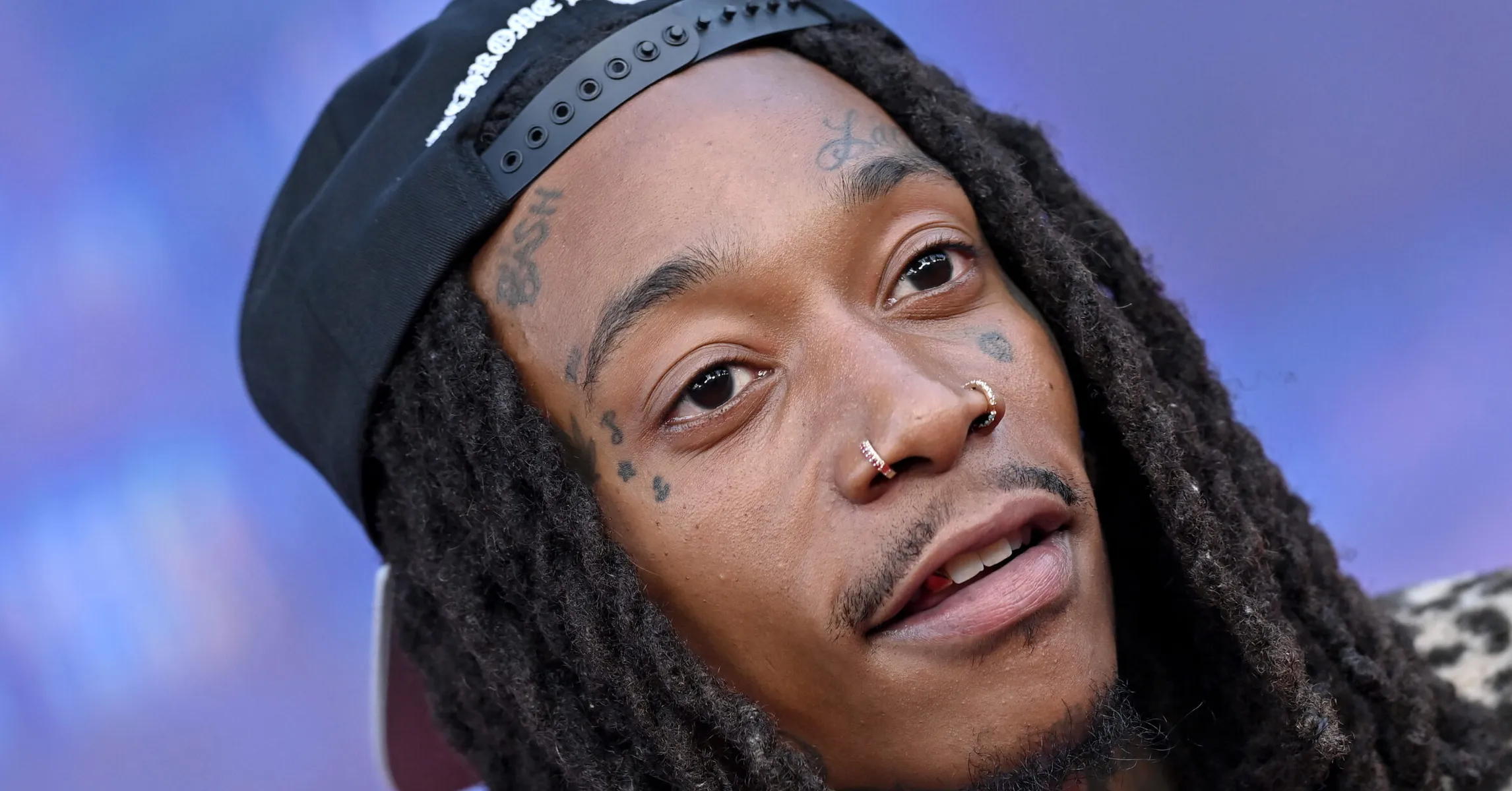 Wiz Khalifa Gets Roasted For Blowing Smoke Into Friend's Mouth
