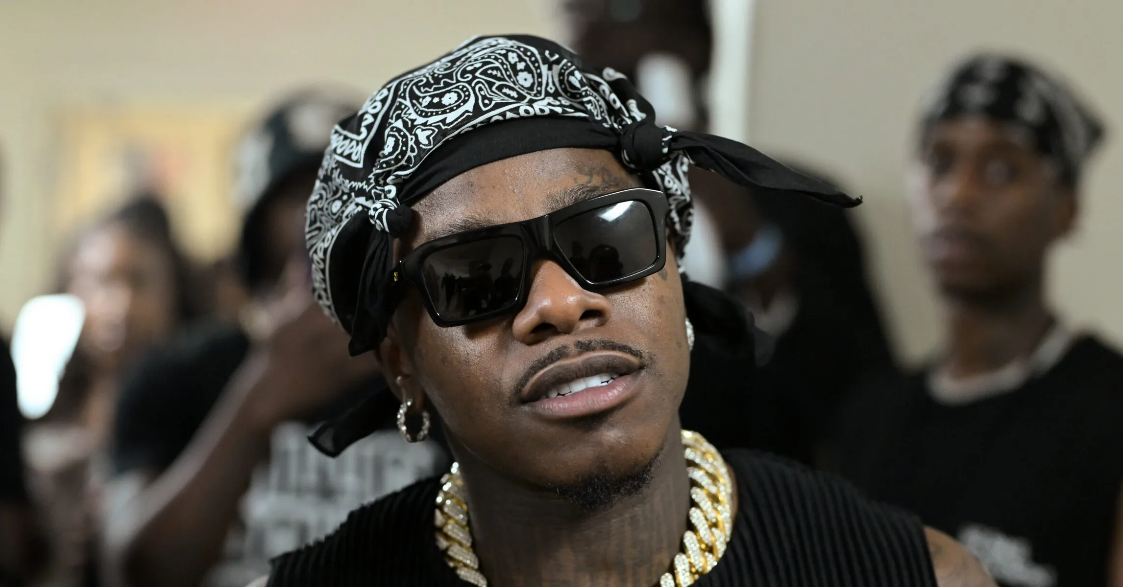 DaBaby Surprises A Kid Washing Car Windows With An Unexpected Pay Day