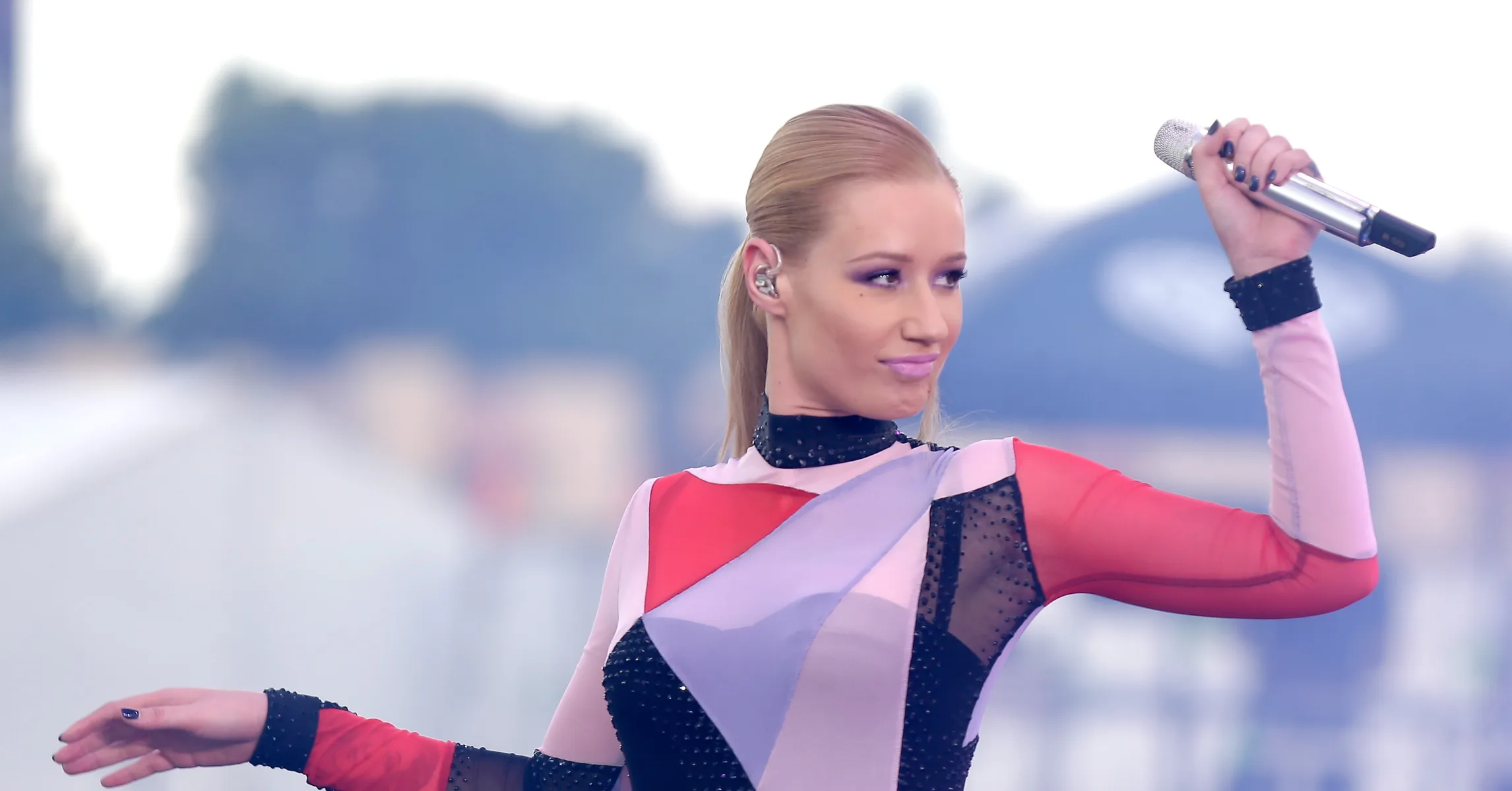 Iggy Azalea Uses A Single Rose To Cover Herself In New Photos