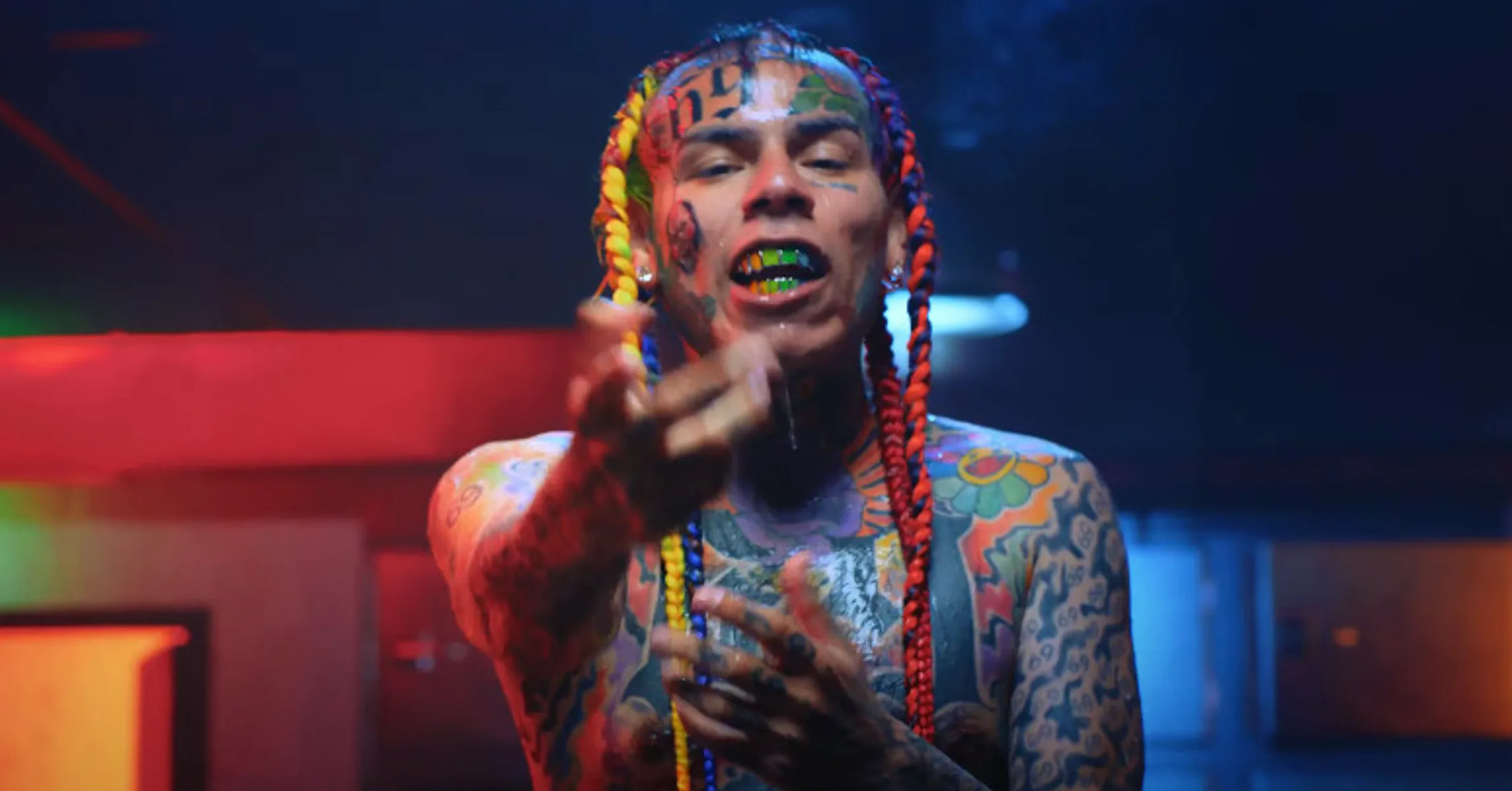 6ix9ine Flaunts A Whole Lot Of Women & Paints In New Visual For "GINÉ"