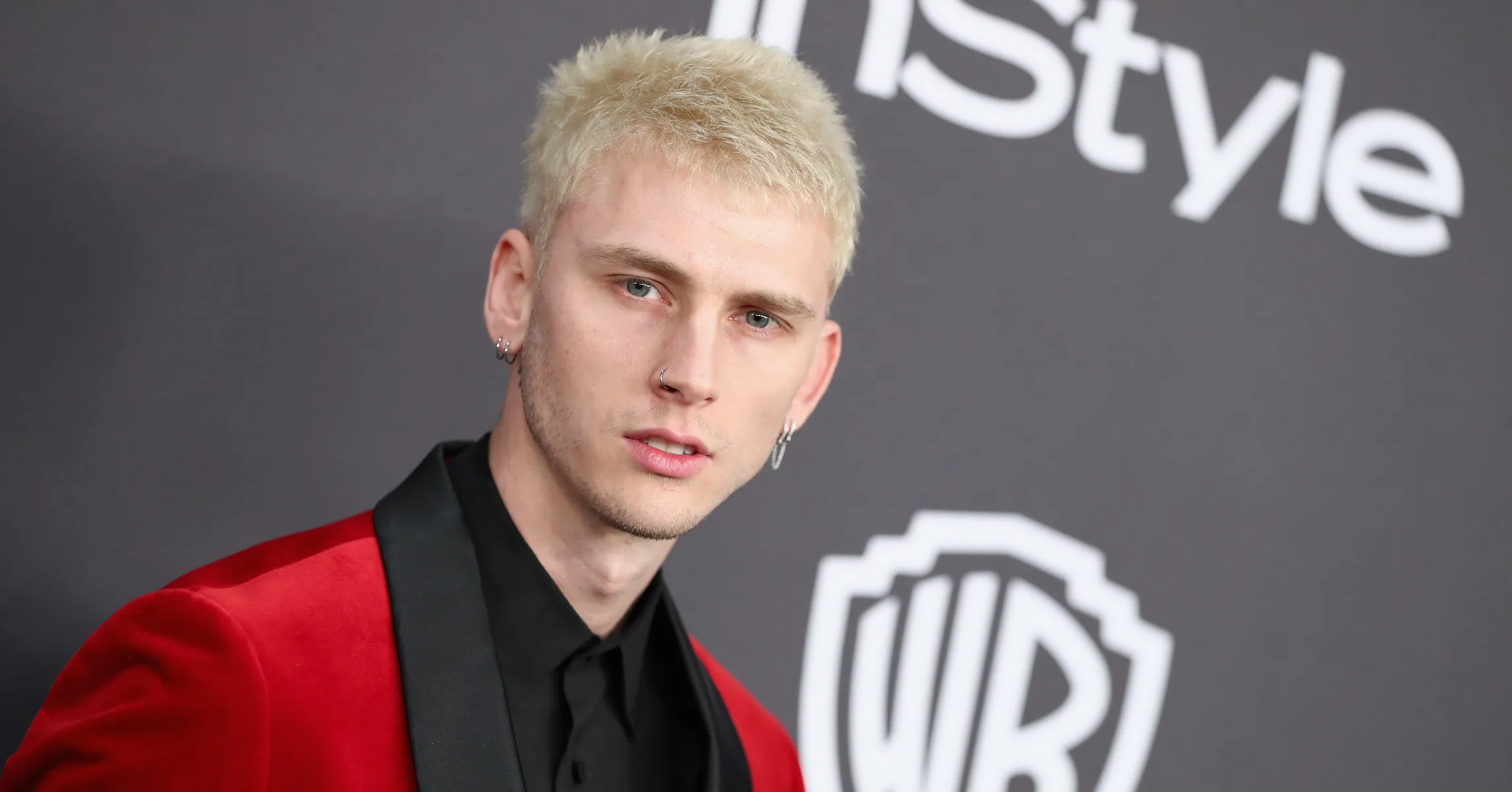 Machine Gun Kelly Swims With Pigs While Vacationing In The Bahamas