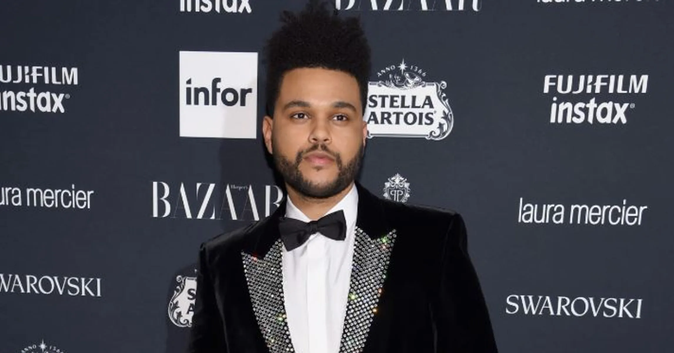The Weeknd Debuts New Look On Toronto Film Festival Red Carpet