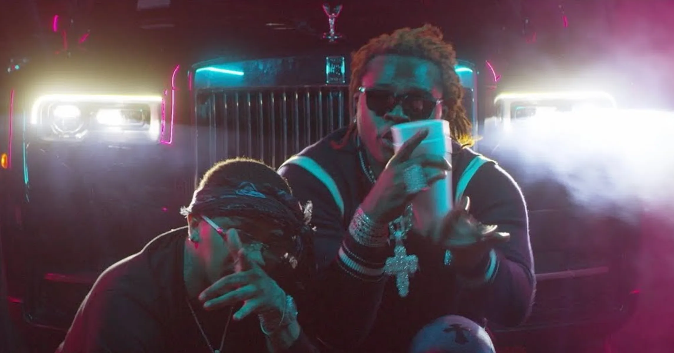 Nechie & Gunna Have A YSL Party In "Stackin It" Video