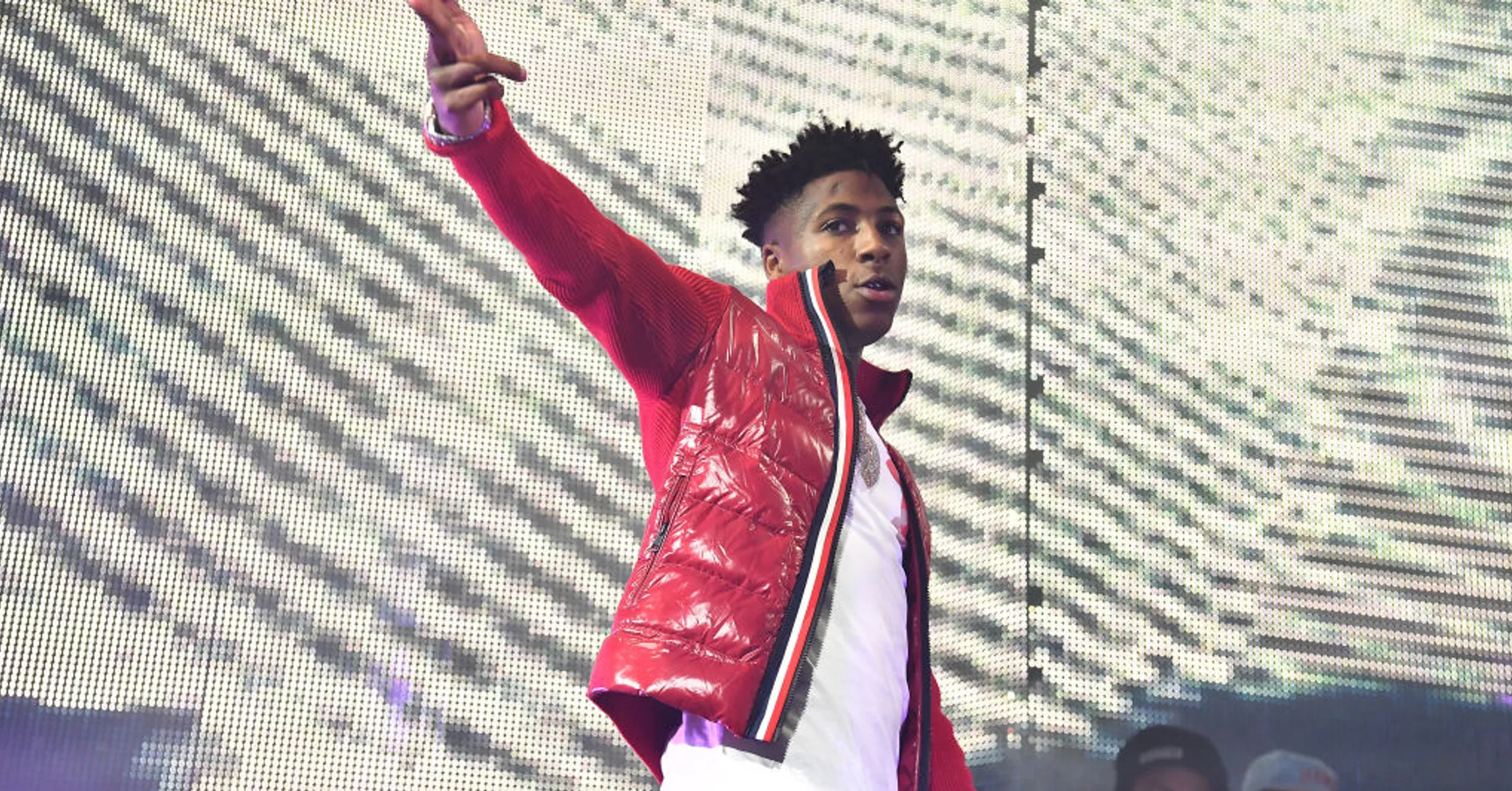 NBA YoungBoy Shows Off Plaque For Having 100 Platinum & Gold Singles