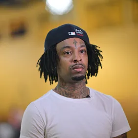 21 Savage Fan Rushes To Him For A Hug During Tour Stop With Drake