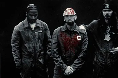Eminem Chainsaws Slim Shady To Pieces In "Tobey" Music Video