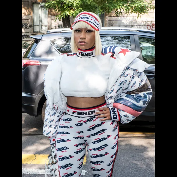 Nicki Minaj Straddles Her Husband In A Green Thong In Spicy New Photos