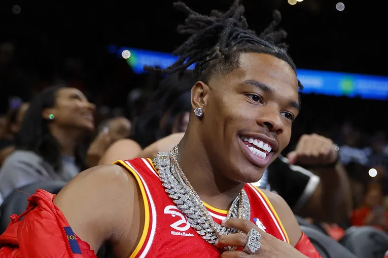 Lil Baby Takes His Family To Hawks & Celtics Game