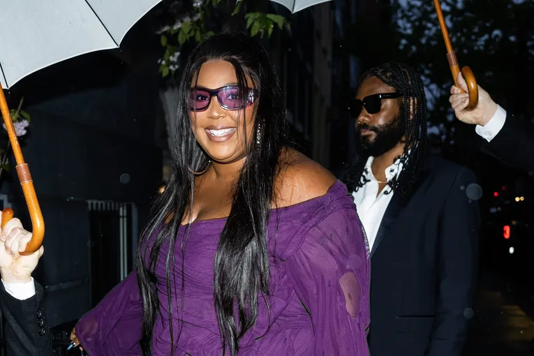 Lizzo All Smiles As She Attends Pre-Met Gala Dinner