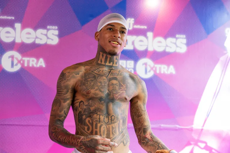 NLE Choppa Has Students All Over The World Doing His Signature Walk At ...