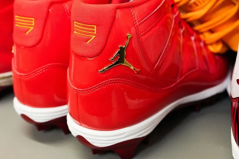 Travis Kelce’s Air Jordan 11 Cleats Shine On Super Bowl Stage