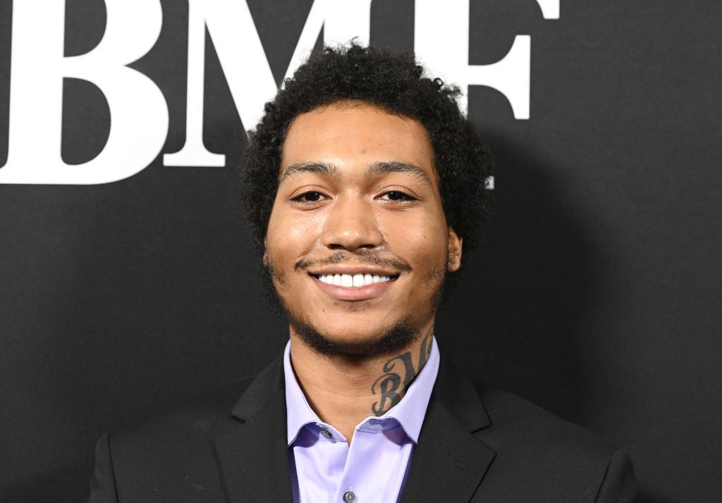 Lil Meech Has To Use A Step Stool To Pose Next To 50 Cent