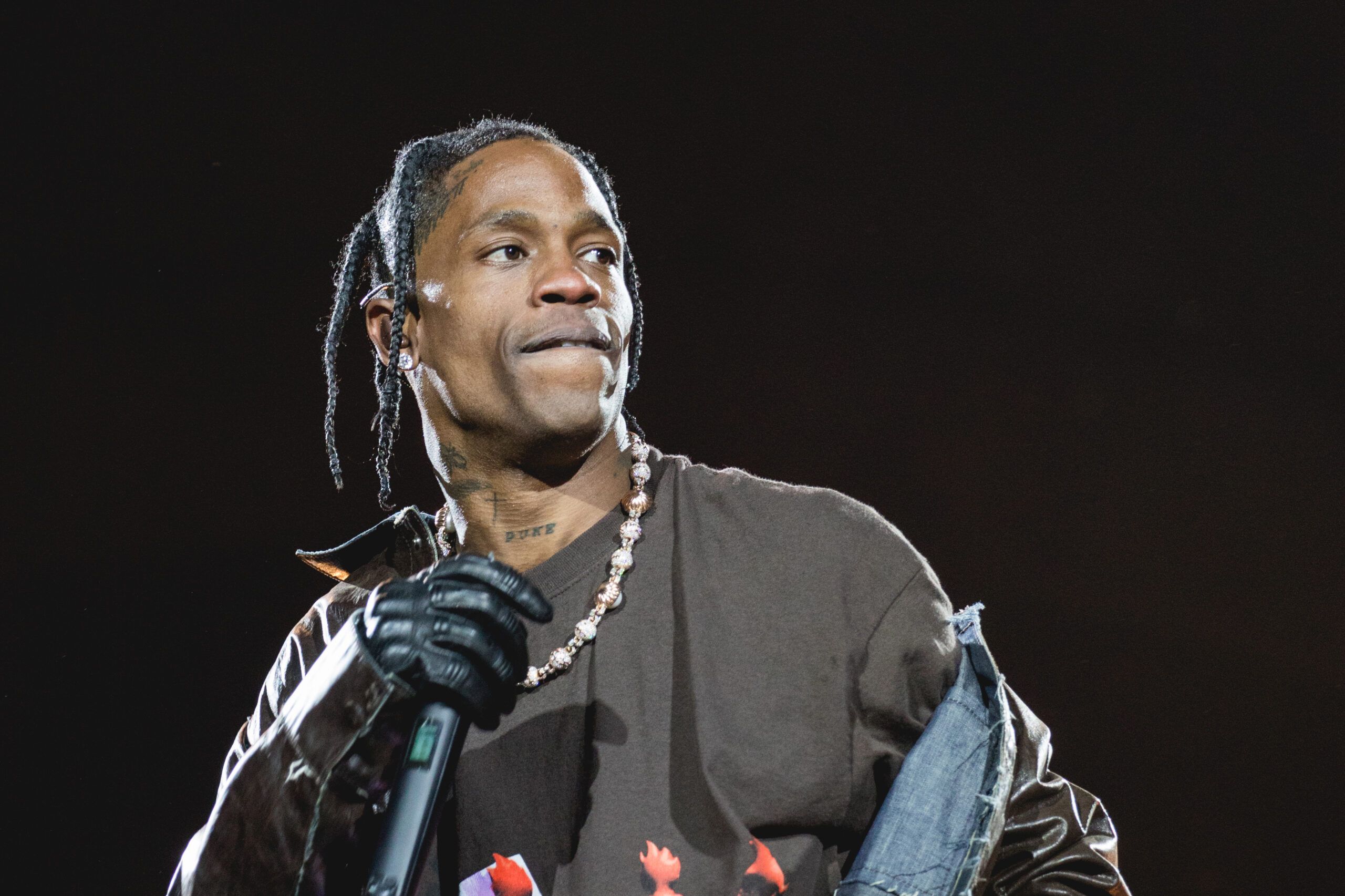 Travis Scott Grabs Wannabe Stage Diver And Rages With Him: Watch