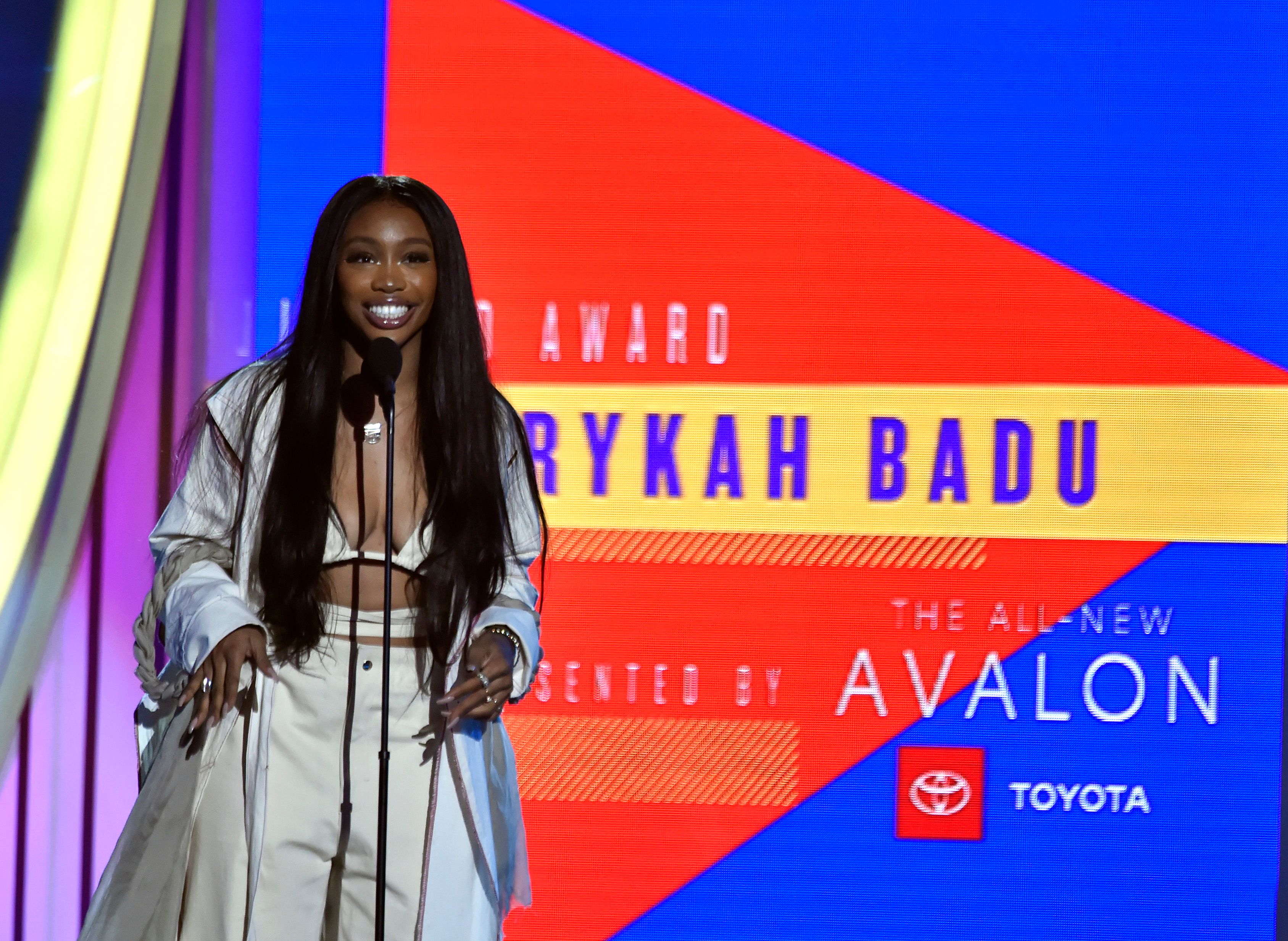 SZA Sends Love To "Extended Family" Around The World After Tattoo By ...